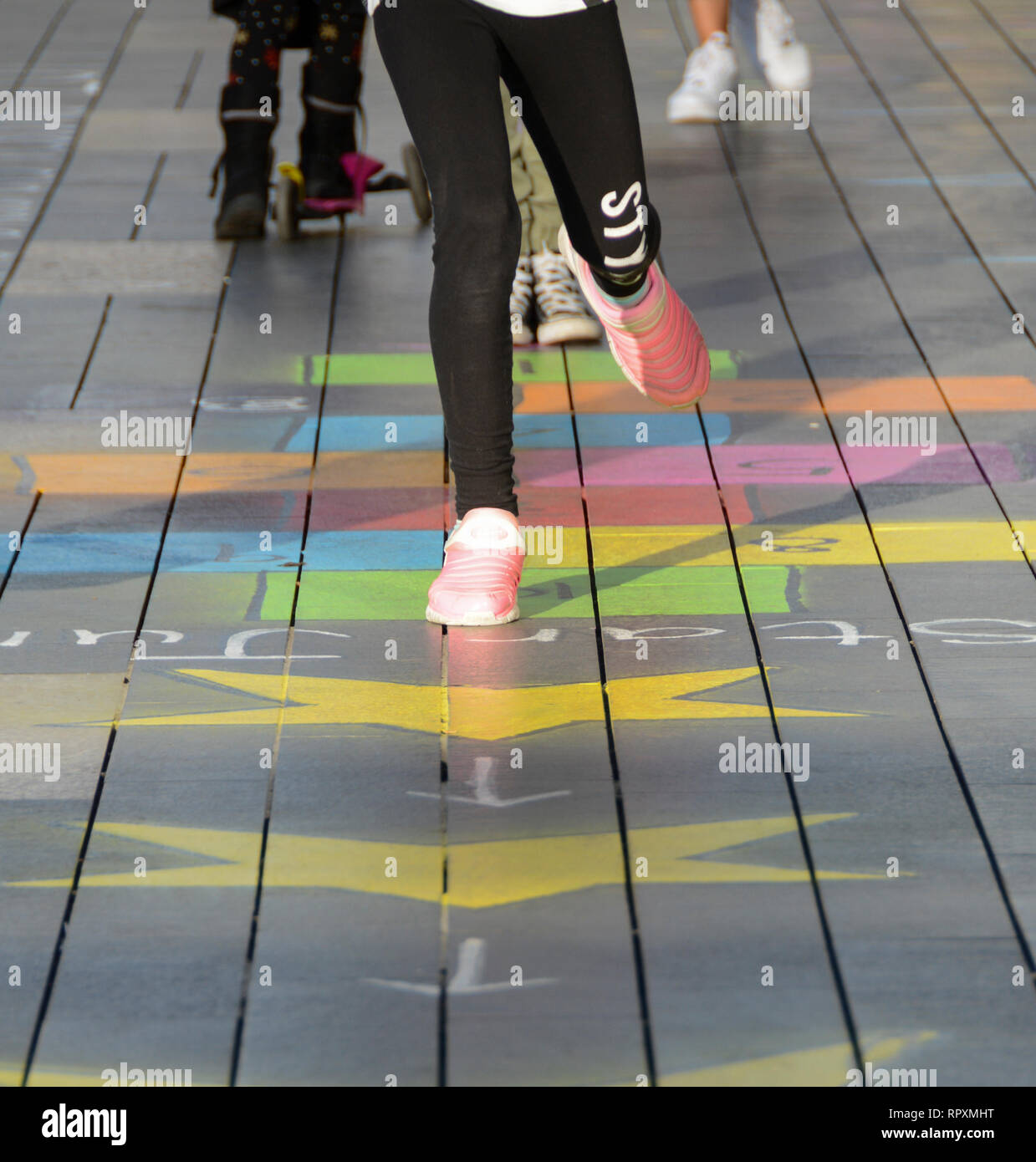 Children playing hopscotch game hi-res stock photography and images - Alamy