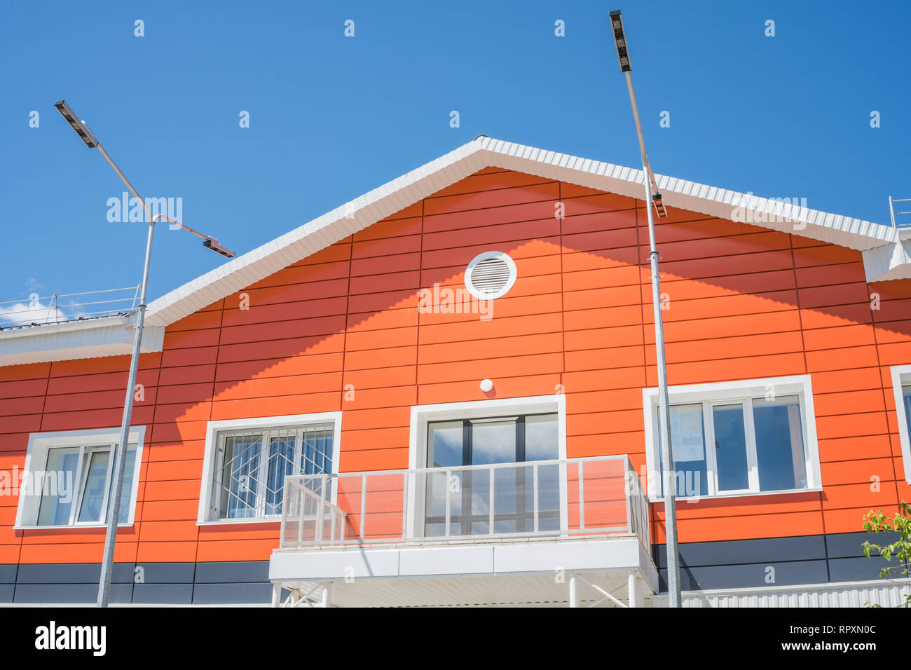 Orange color building hi-res stock photography and images - Alamy