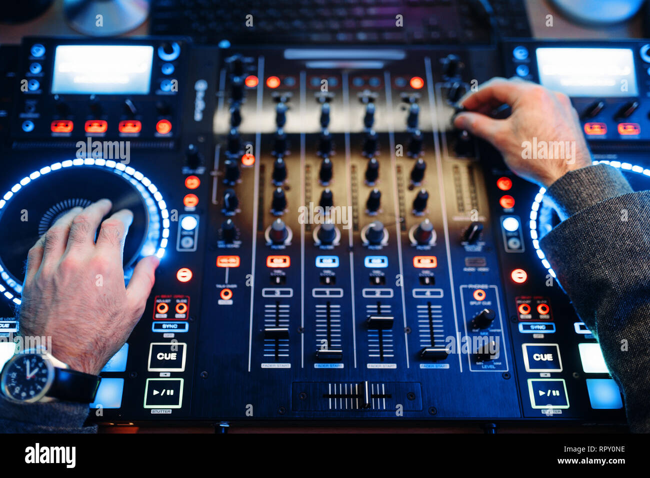 Sound operator hands over the remote control panel in the recording ...