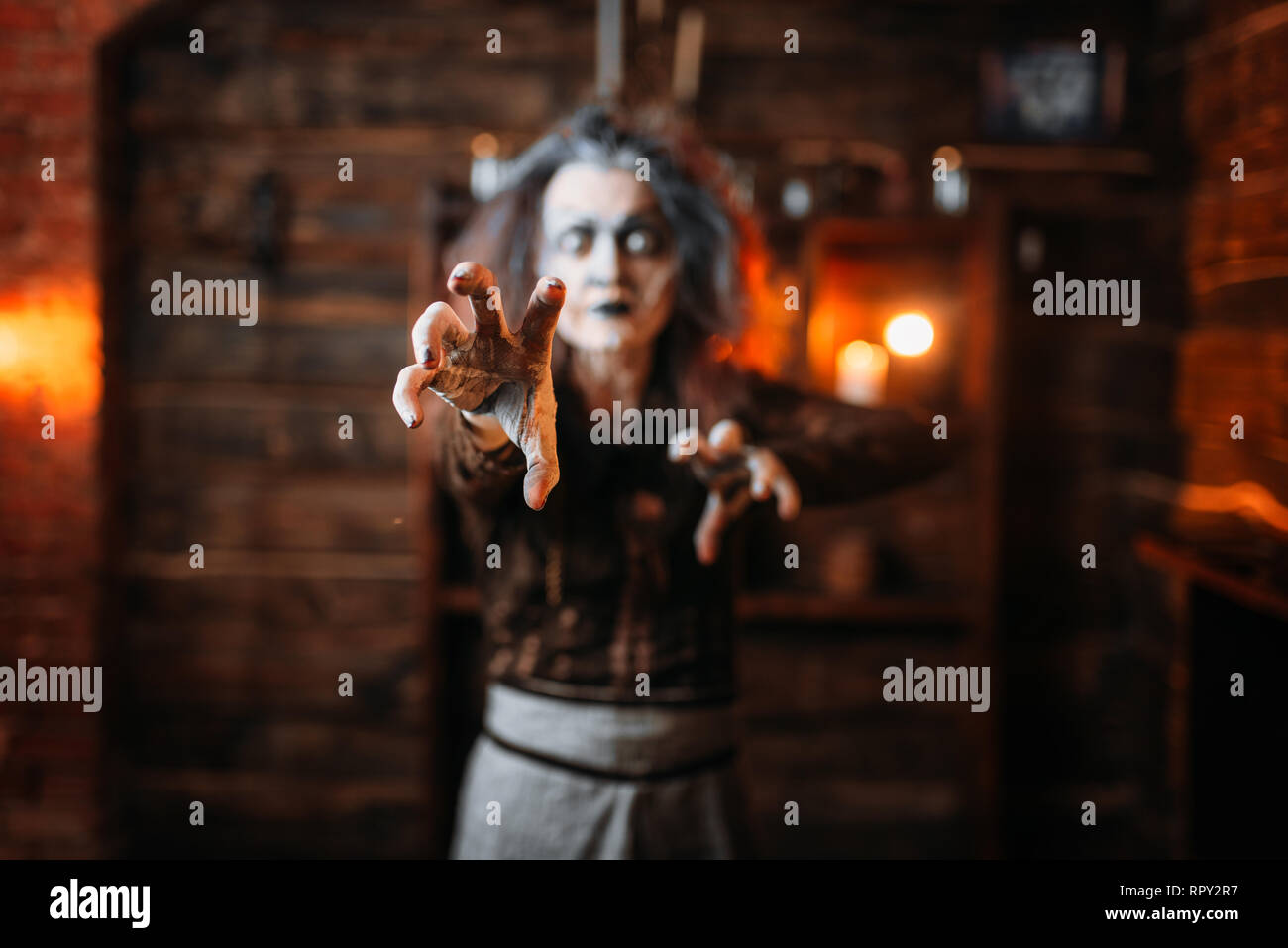 Scary witch hands out, front view, spiritual seance. Female foreteller ...