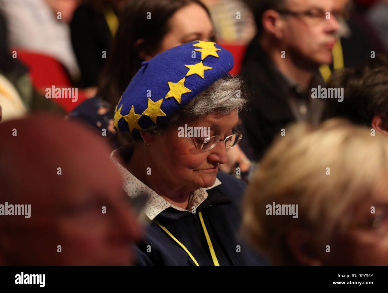 A member of the audience wears a European flag covered beret hat at the ...