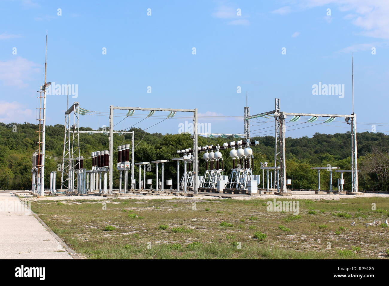 Local power plant dense array of support electrical equipment on strong ...