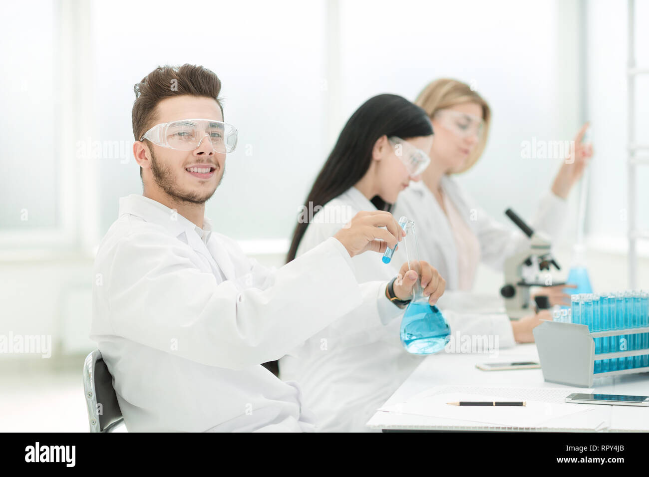 group of scientists conduct research in the laboratory Stock Photo - Alamy