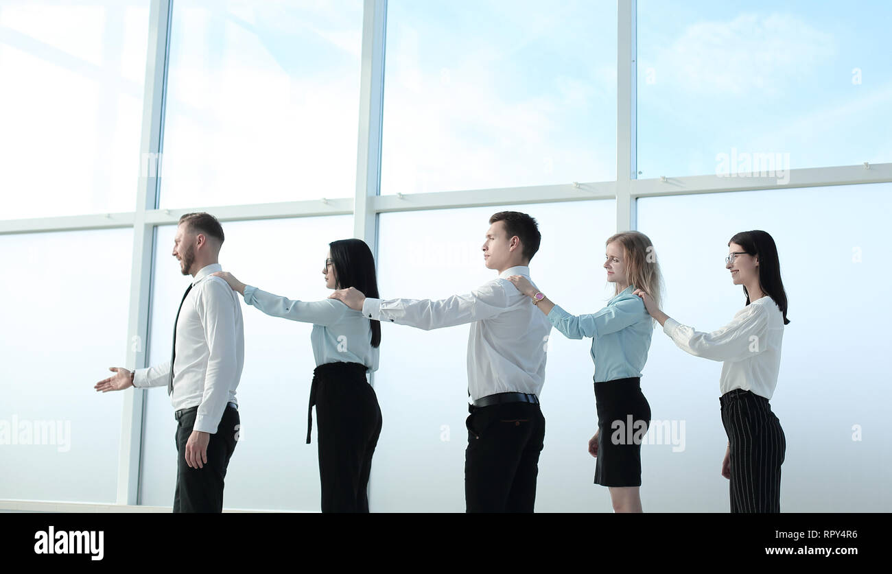 professional business team standing near the office window Stock Photo ...