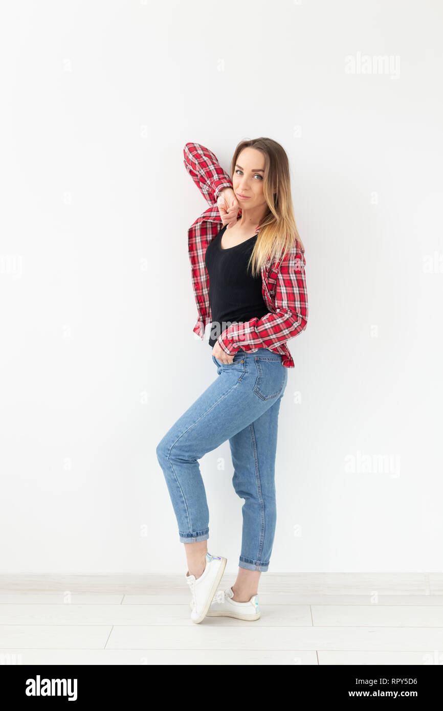 People and fashion concept - Full length image of woman posing sideways ...