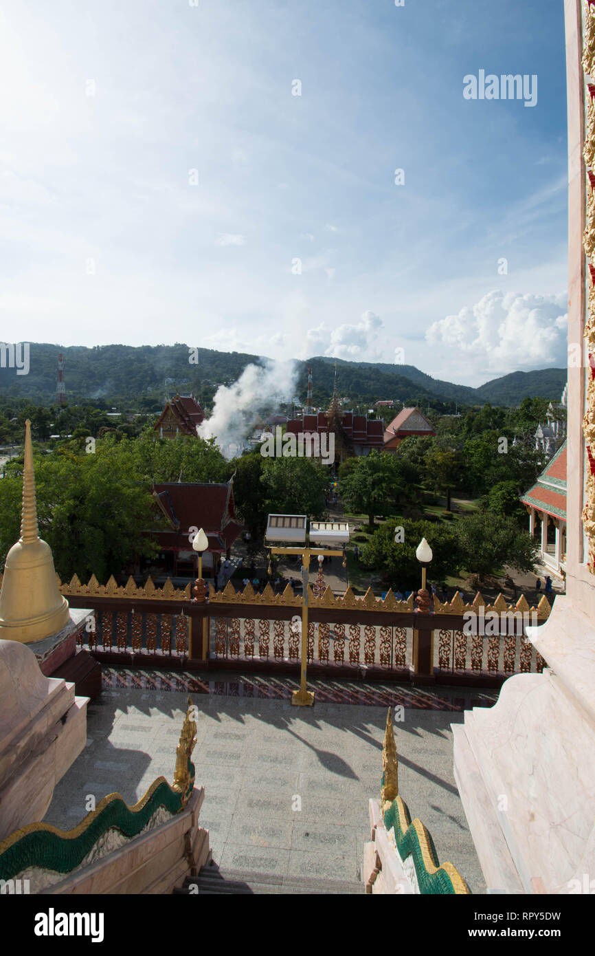 Thailand temple smoke in sky Stock Photo - Alamy