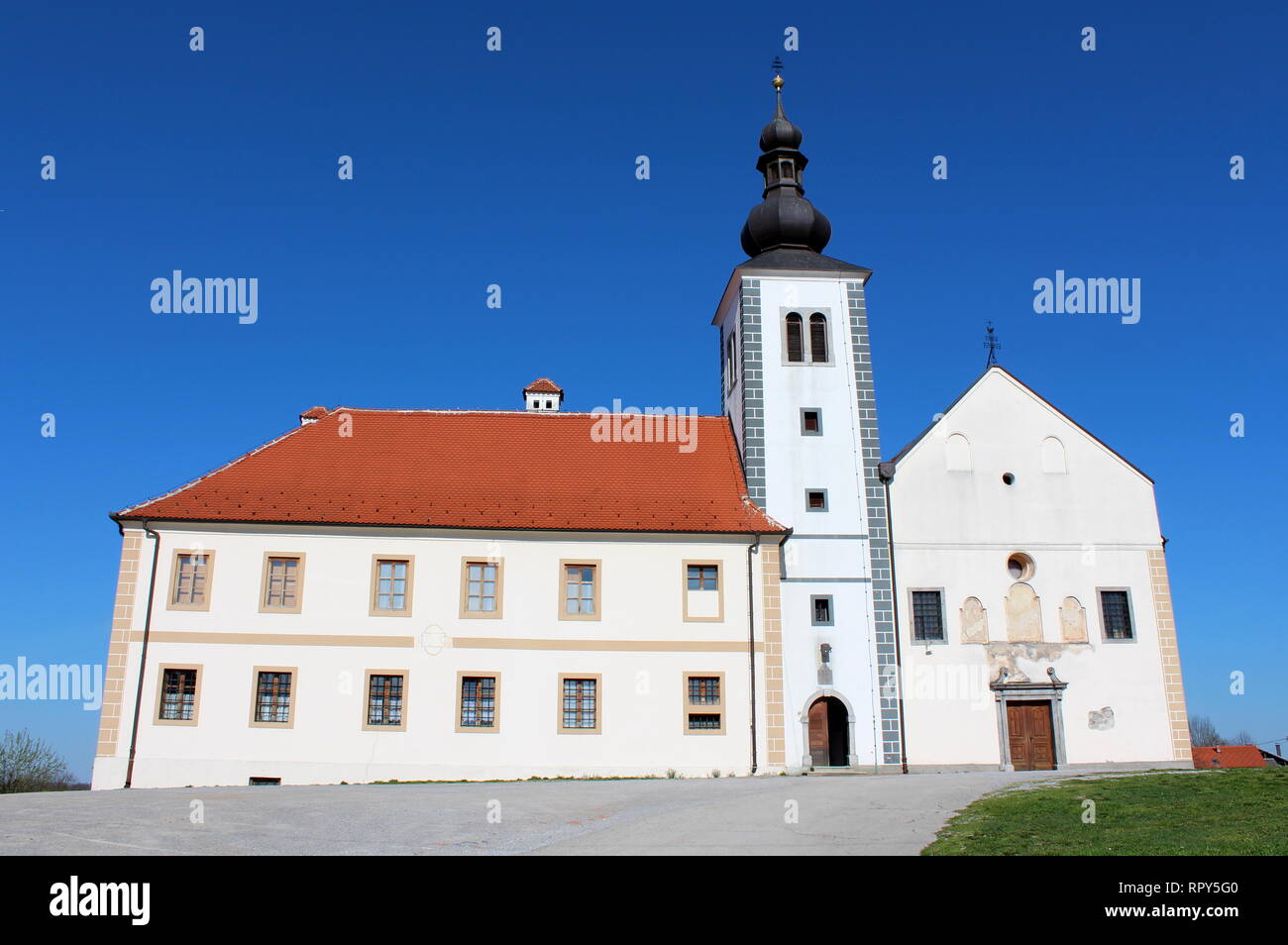 Old church with partially restored outer facade on top of small hill ...