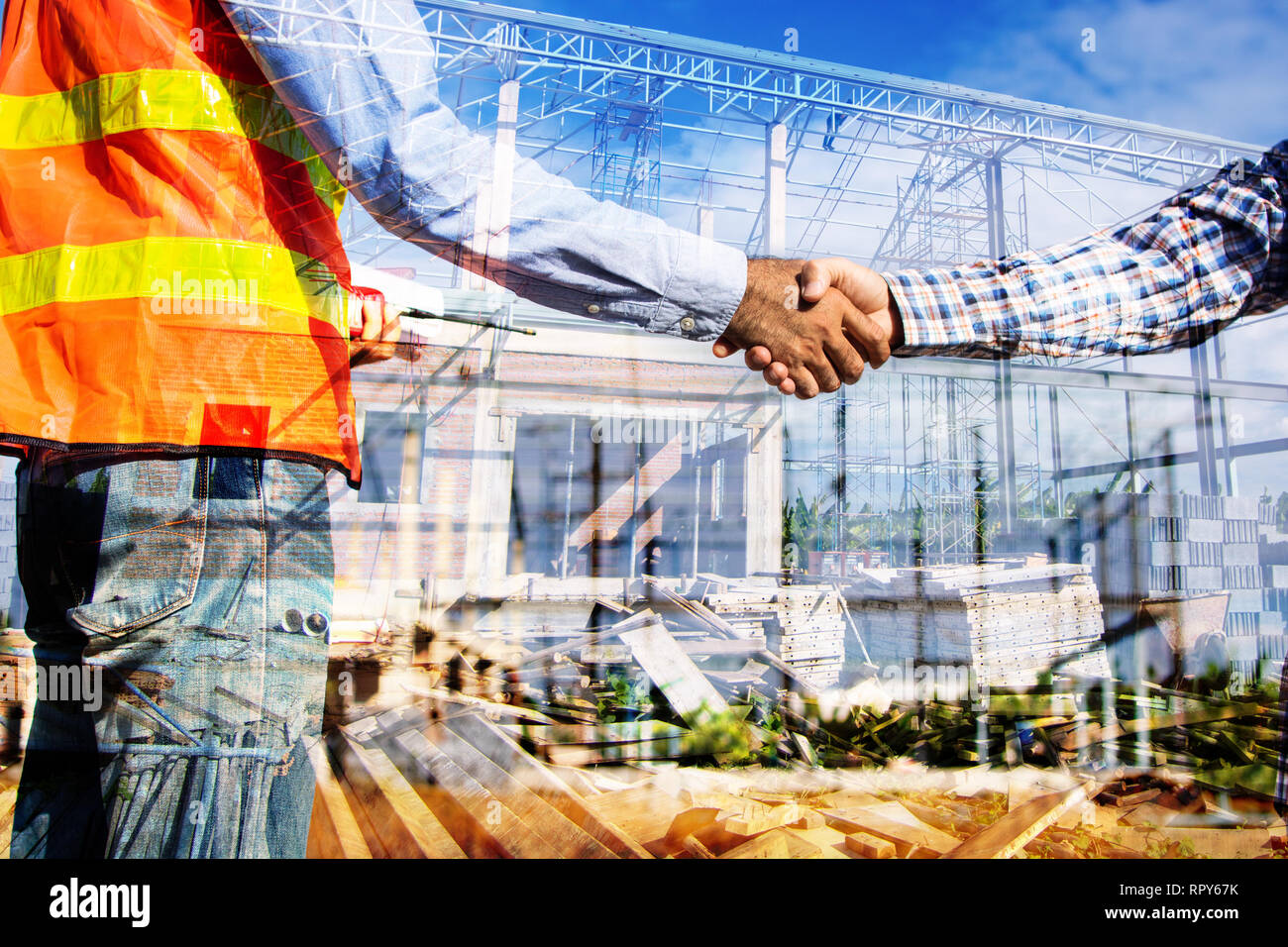 construction worker shake hands and negotiation Stock Photo - Alamy