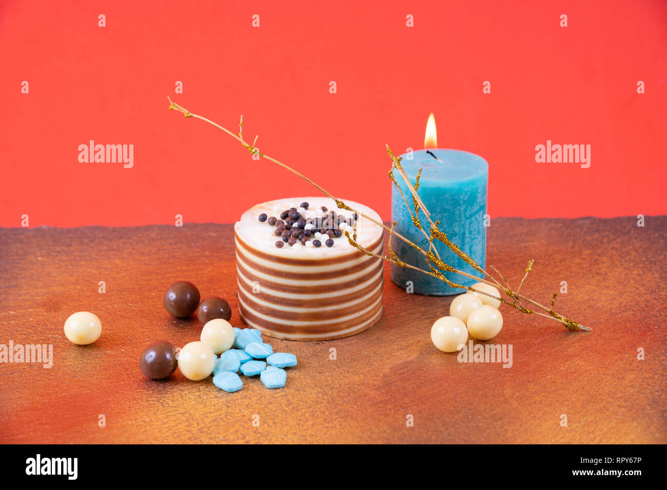 light and sumptuous pastry on a decorated support and with a colored ...