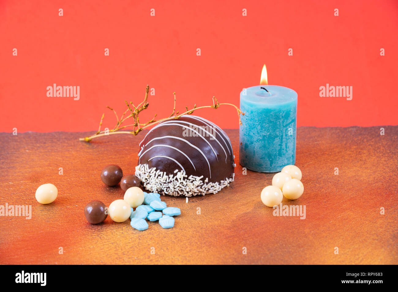 light and sumptuous pastry on a decorated support and with a colored ...