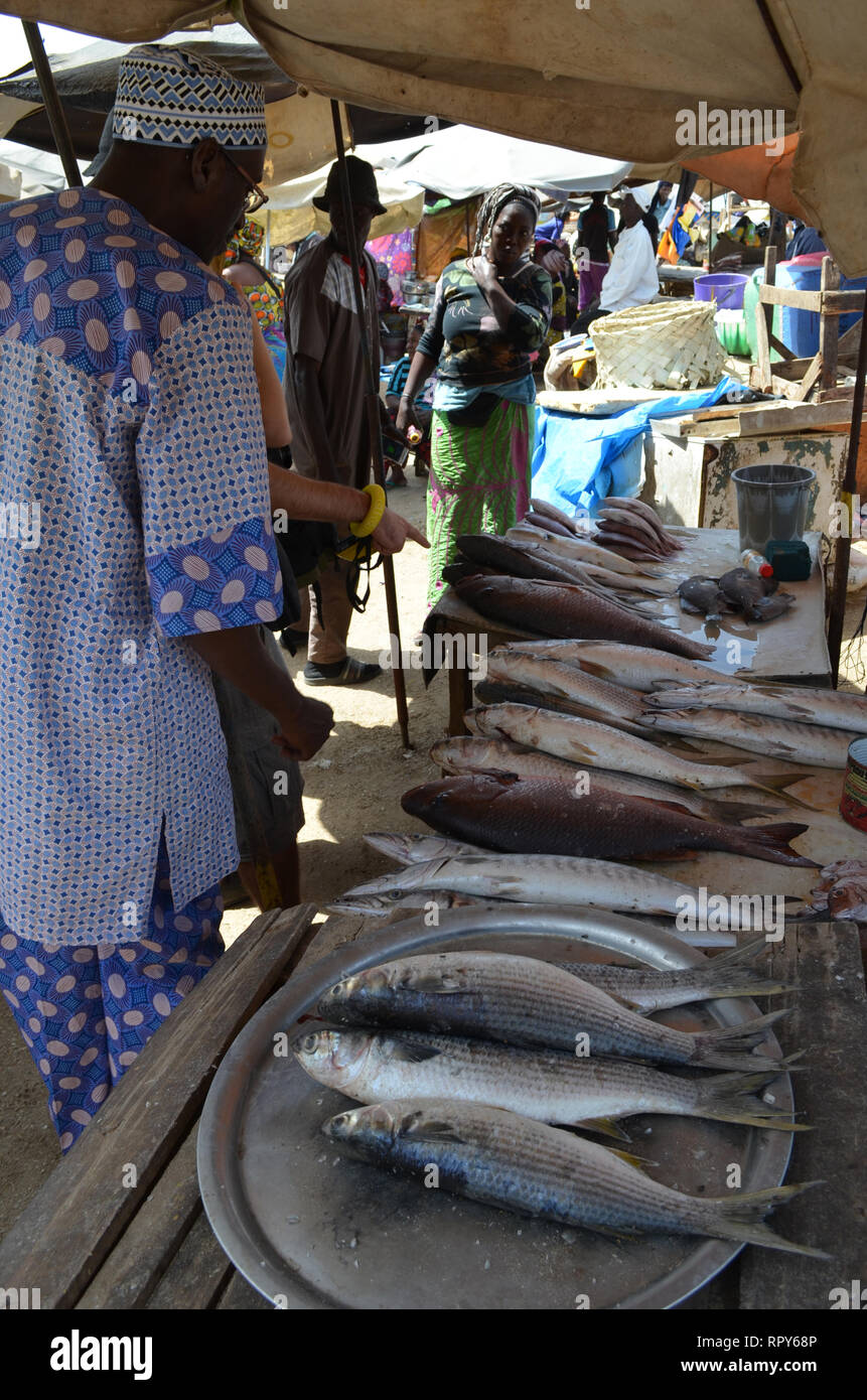 Busy fish market in Mbour, Senegal, a regional trade hub Stock Photo ...