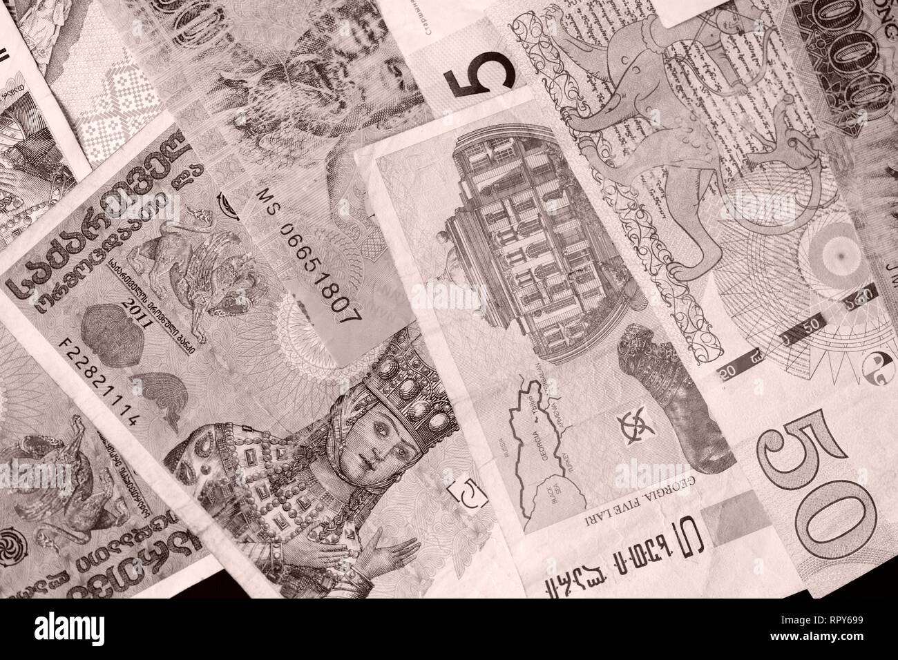 Different countries money background close up. Brown color toned Stock ...