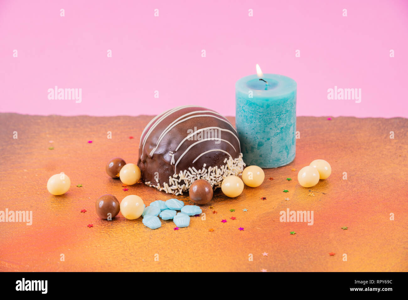 light and sumptuous pastry on a decorated support and with a colored ...