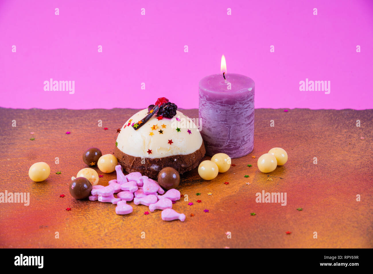 light and sumptuous pastry on a decorated support and with a colored ...