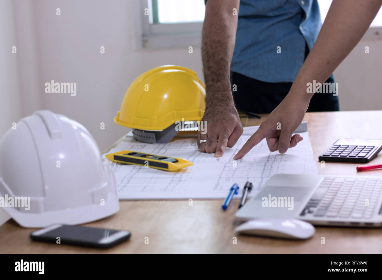 engineer planning with architect, professional person Stock Photo - Alamy