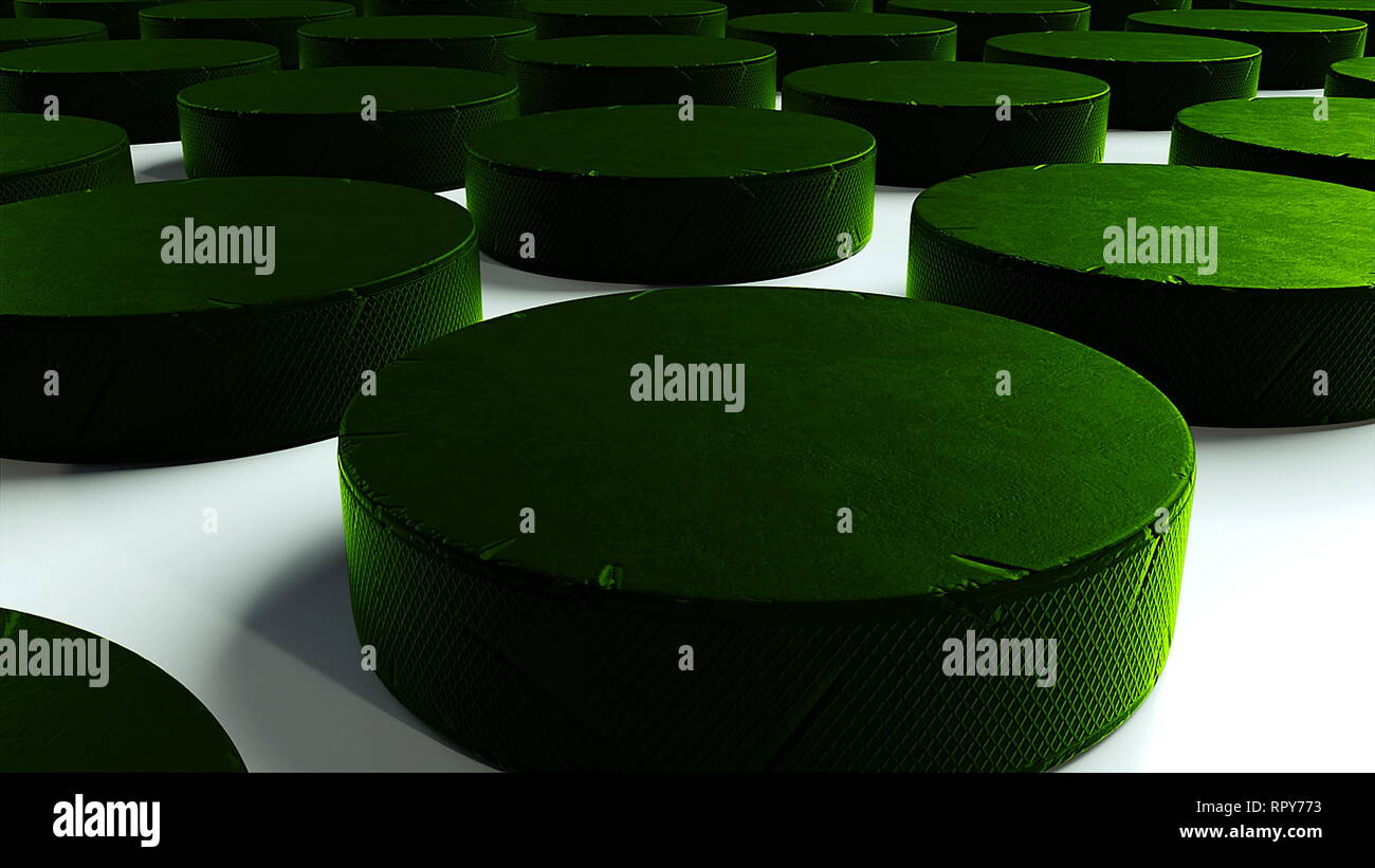 Many rows of black hockey pucks are on surface, sporty computer ...
