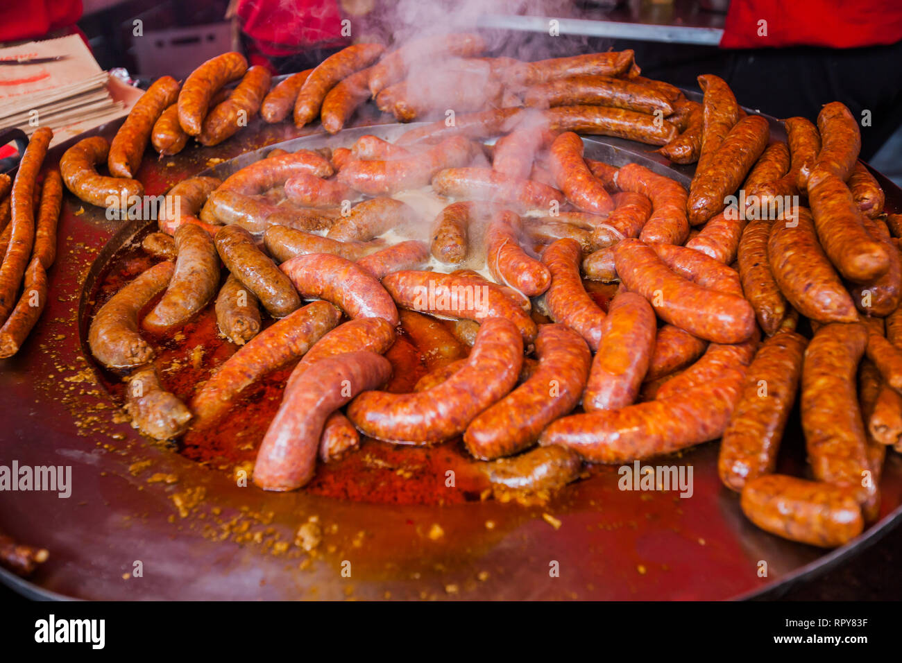 Fried pork sausage at gastronomy fair - Traditional Serbian street food ...