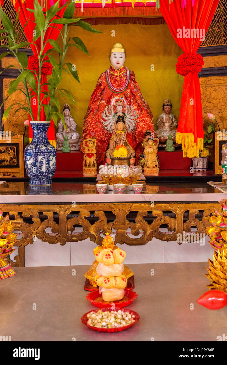Offering in front of Altar and Deity in the San Duo Chinese Temple ...
