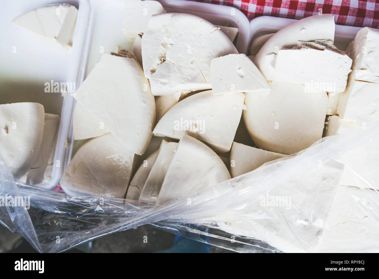 Fresh farmers cheese on local open food marketplace stand Stock Photo ...