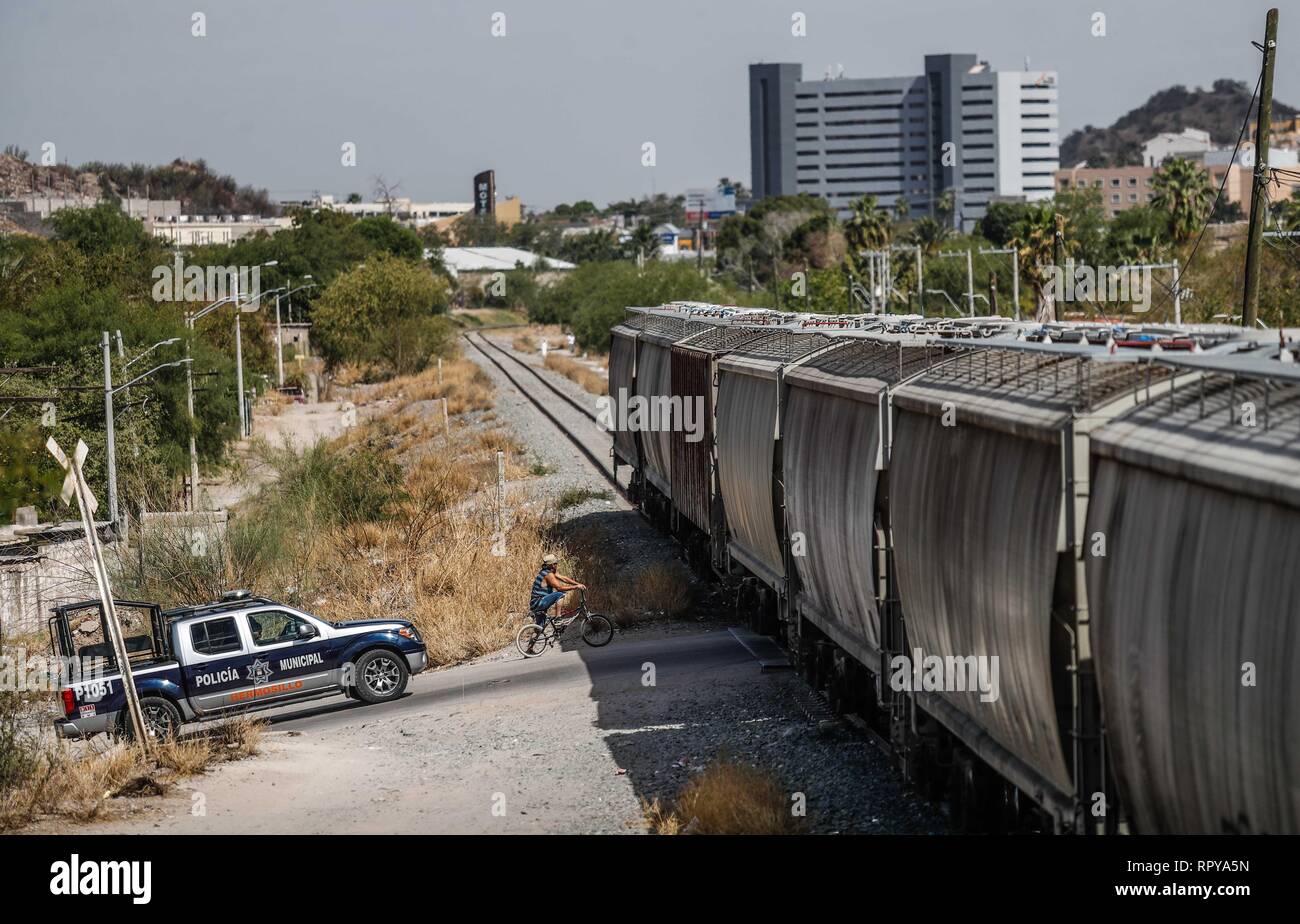 Train or Mexican railways passing through the popular colony in ...