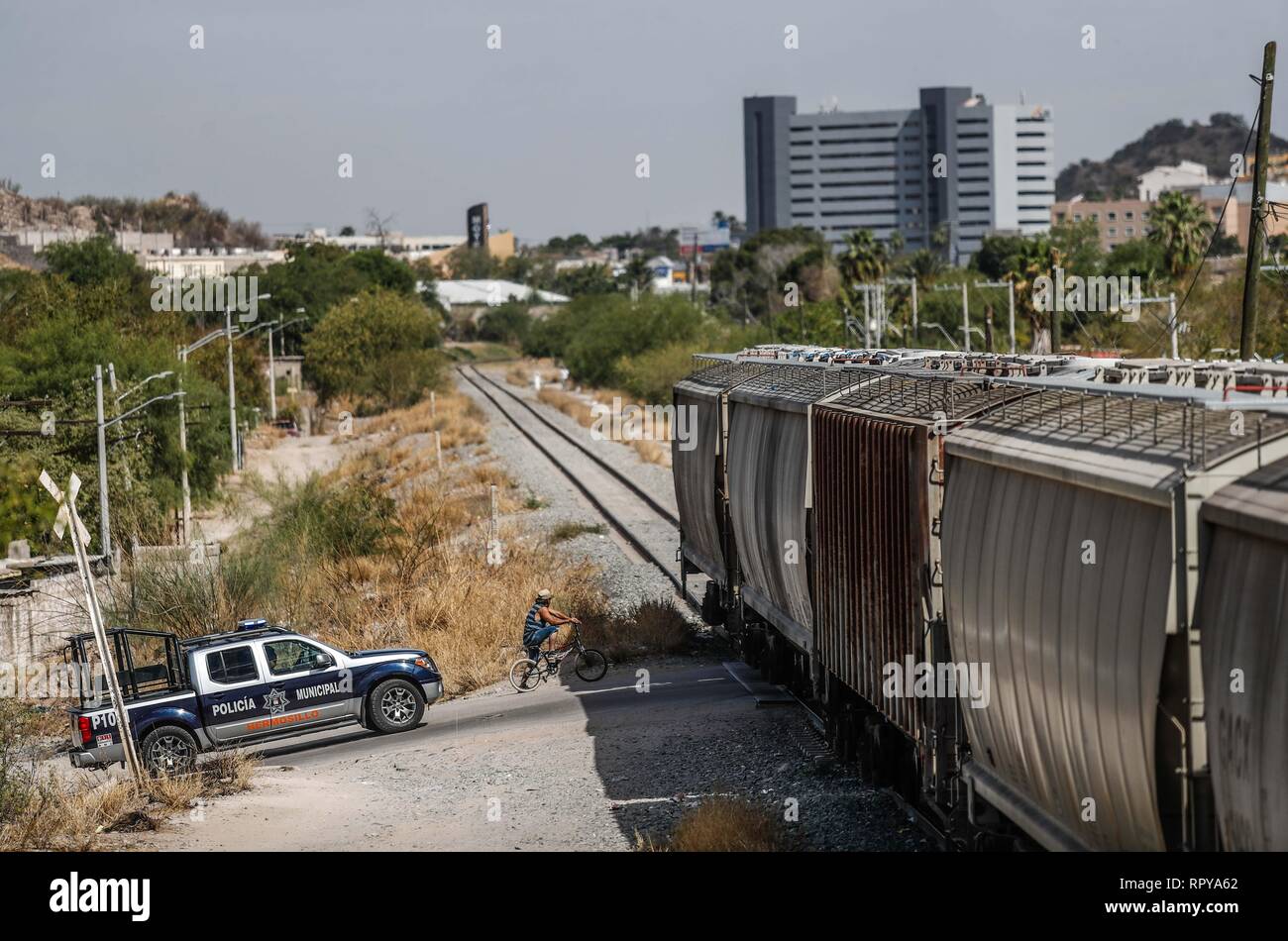Train or Mexican railways passing through the popular colony in ...