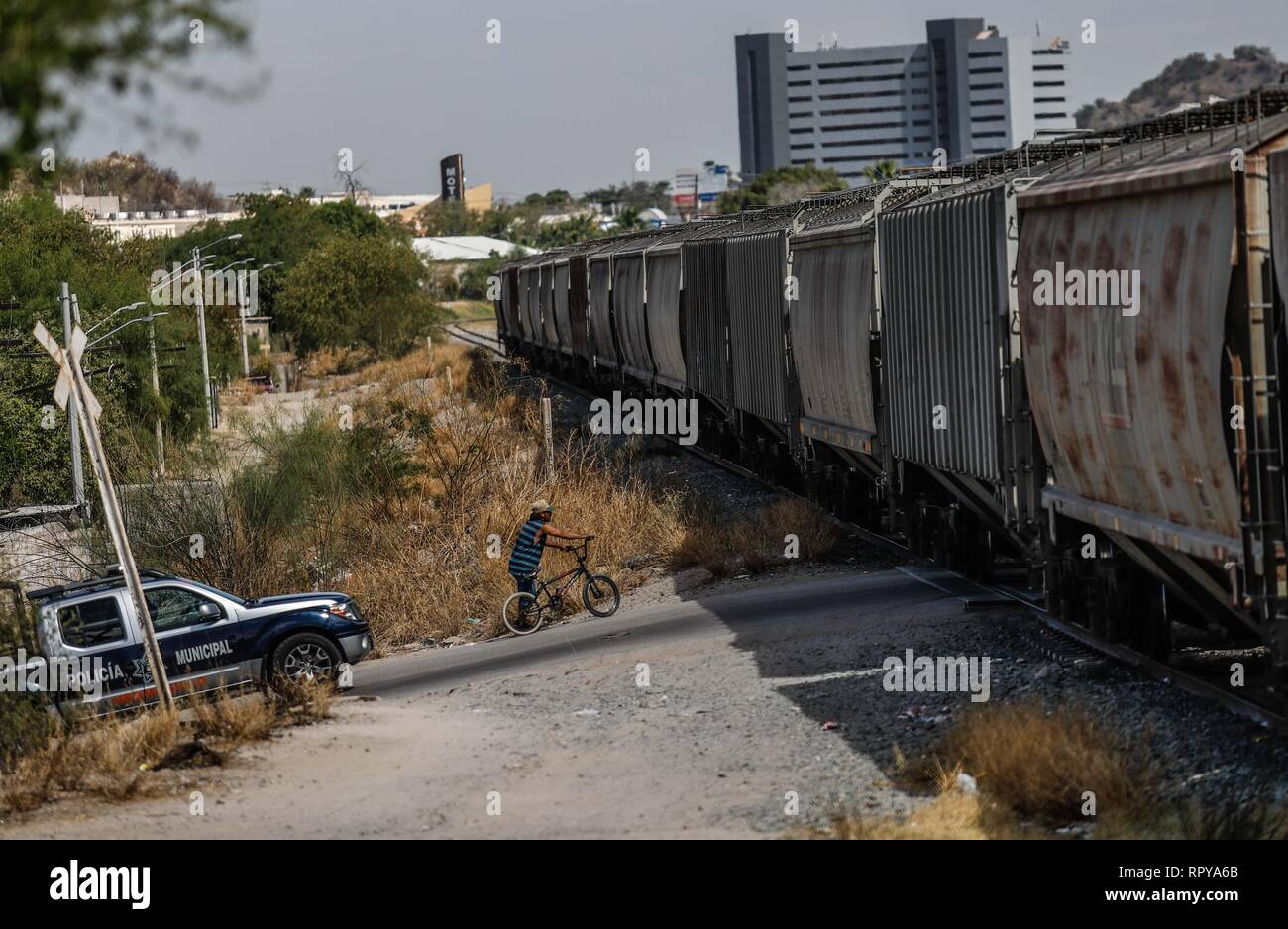 Train or Mexican railways passing through the popular colony in ...
