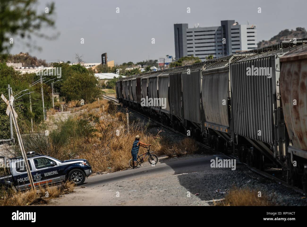 Train or Mexican railways passing through the popular colony in ...