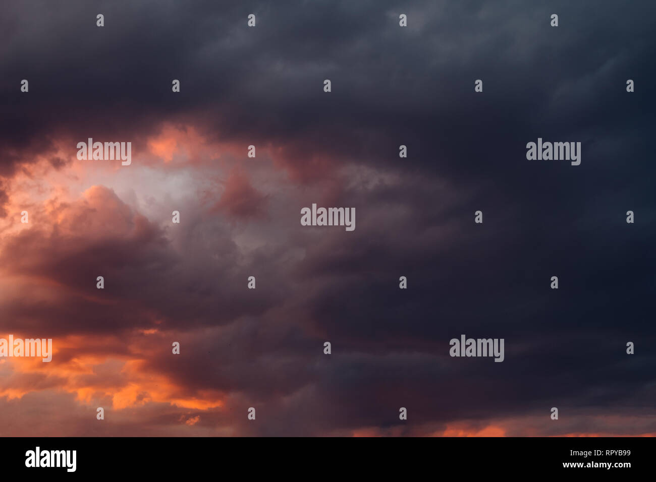 Dark grey cloudy sky background at sunset. Natural texture Stock Photo ...