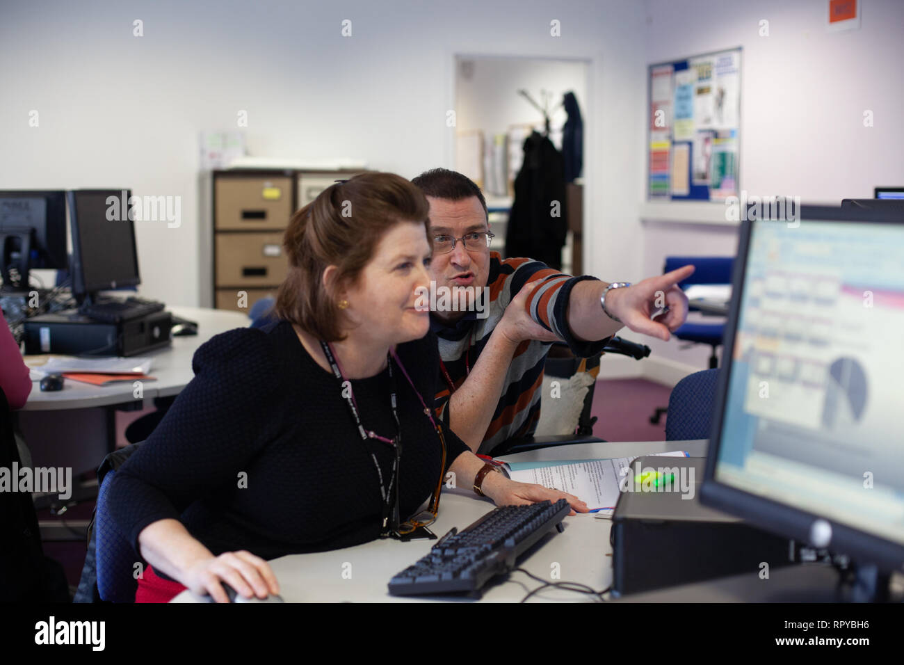 adults in a further education college studying apprenticeships Stock ...