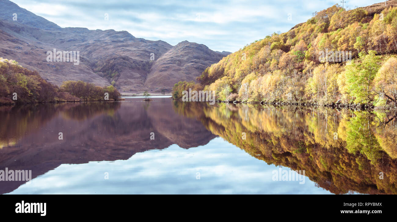 Autumn colours in Highlands of Scotland - trees, mountains, sky, hills ...