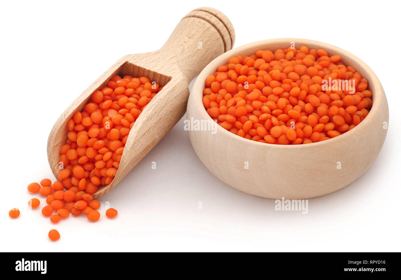 Fresh lentil in a bowl with scoop over white background Stock Photo - Alamy