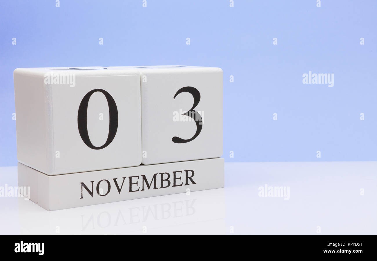 November 03st. Day 3 of month, daily calendar on white table with ...