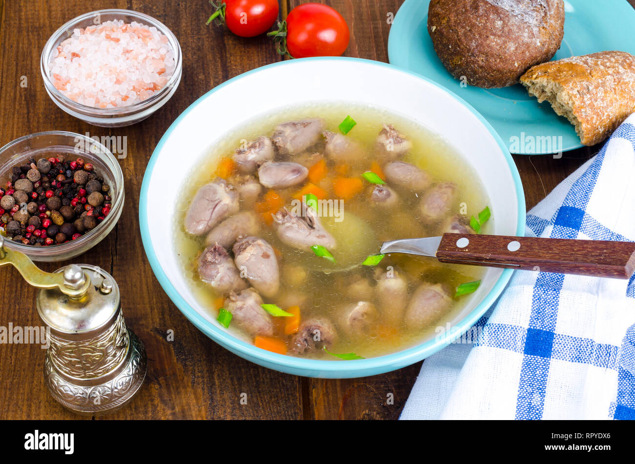 Transparent broth with chicken liver. Studio Photo Stock Photo - Alamy