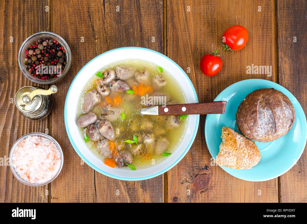 Transparent broth with chicken liver. Studio Photo Stock Photo - Alamy