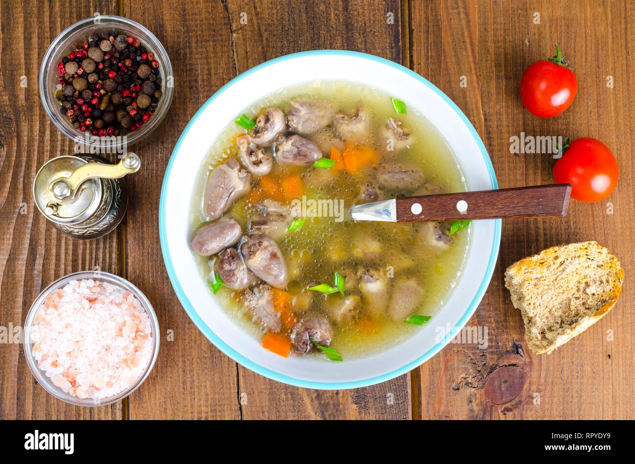 Transparent broth with chicken liver. Studio Photo Stock Photo - Alamy