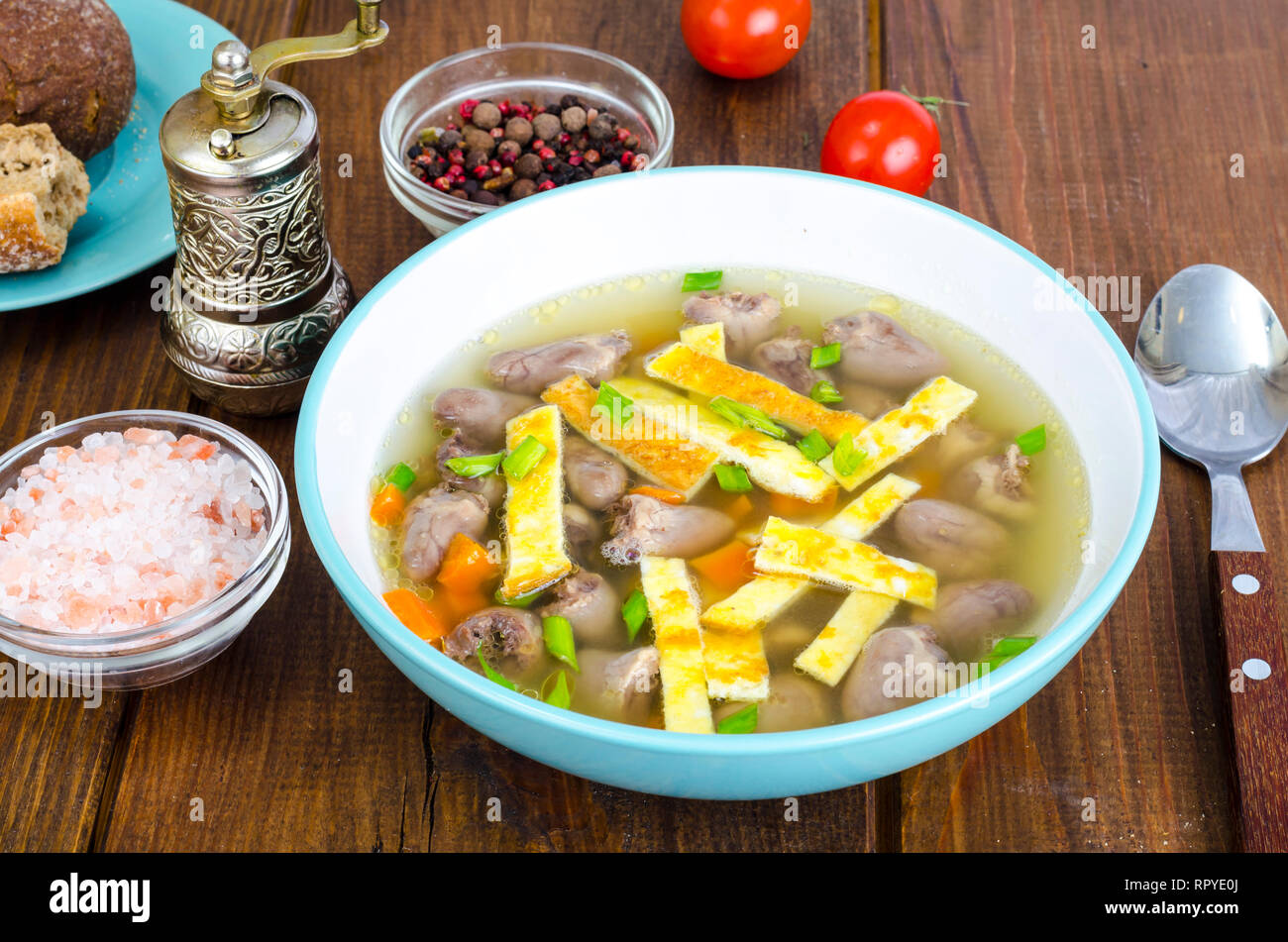 Transparent broth with chicken liver. Studio Photo Stock Photo - Alamy