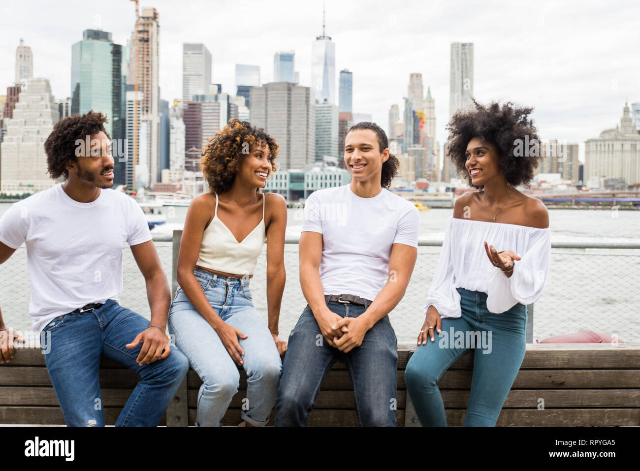 Group of afroamerican friends bonding in Manhattan, New York - Young ...
