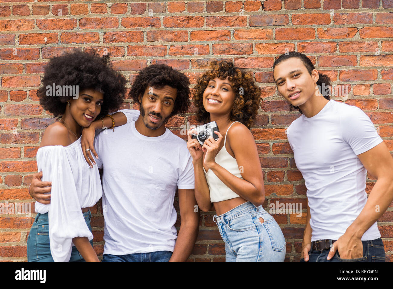 Group of afroamerican friends bonding in Manhattan, New York - Young ...