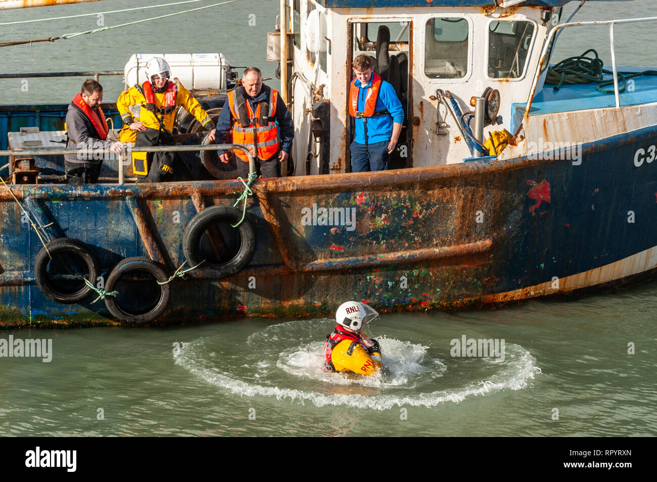Lifeboat crew hi-res stock photography and images - Alamy