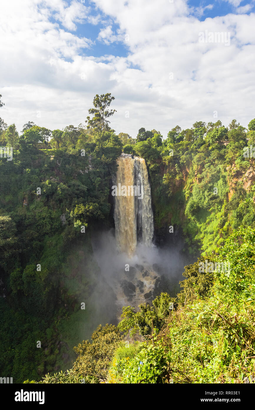 Landscape with a waterfall and clouds. Thompson Waterfall. Kenya ...