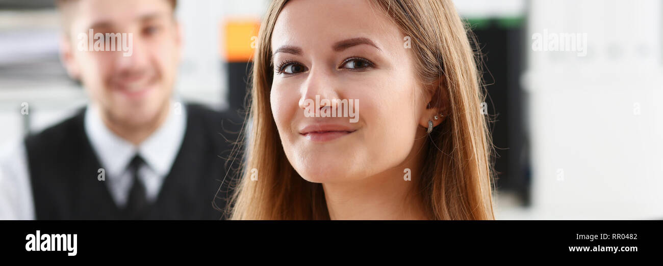 Beautiful smiling cheerful girl at workplace look in camera Stock Photo ...