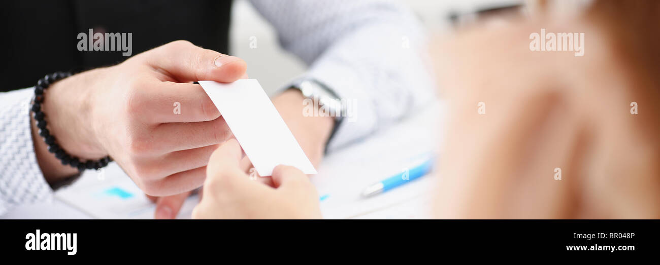 Male hand in suit give blank calling card to visitor Stock Photo - Alamy