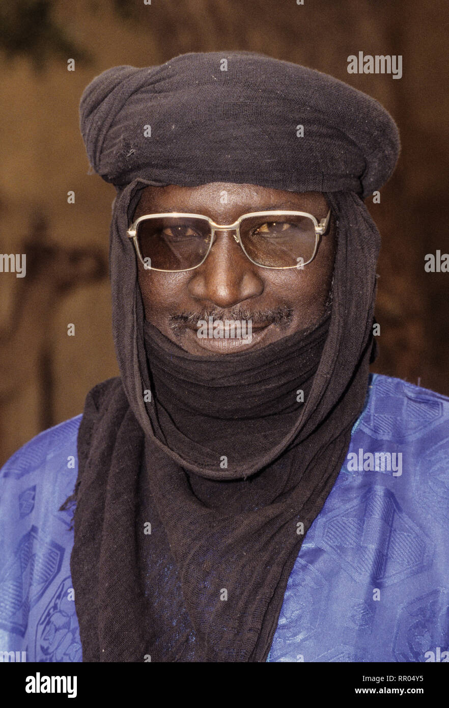 Nigerien Man with Glasses and Turban, Baleyara, Niger Stock Photo - Alamy