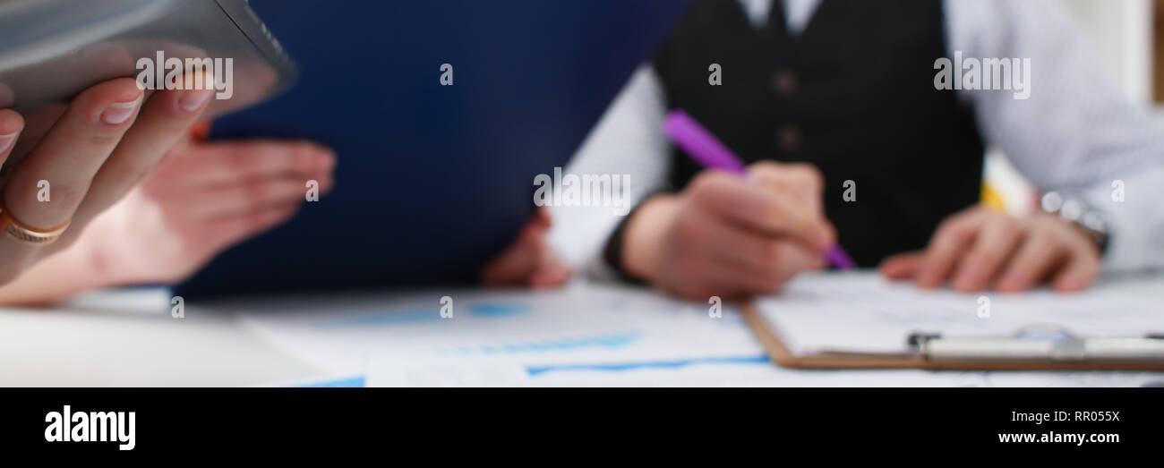 Group of people sit in office deliberate on Stock Photo - Alamy