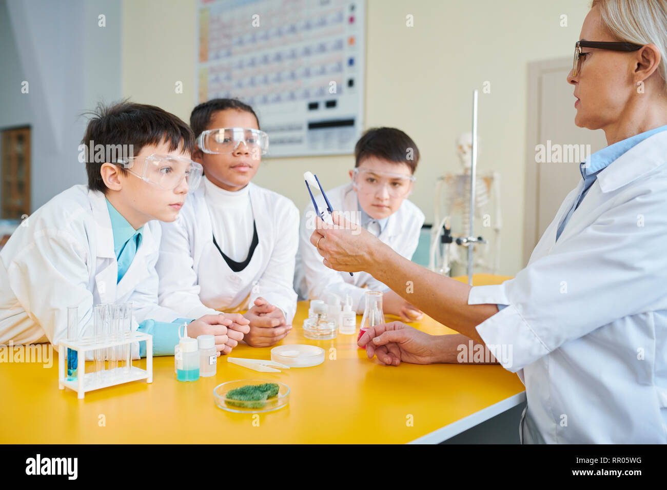 Showing substance to kids Stock Photo - Alamy