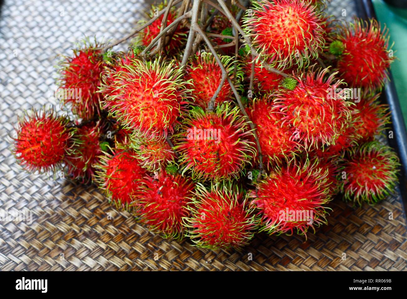 bunch of fresh Rambutan, red and hairly tropical fruits Stock Photo - Alamy