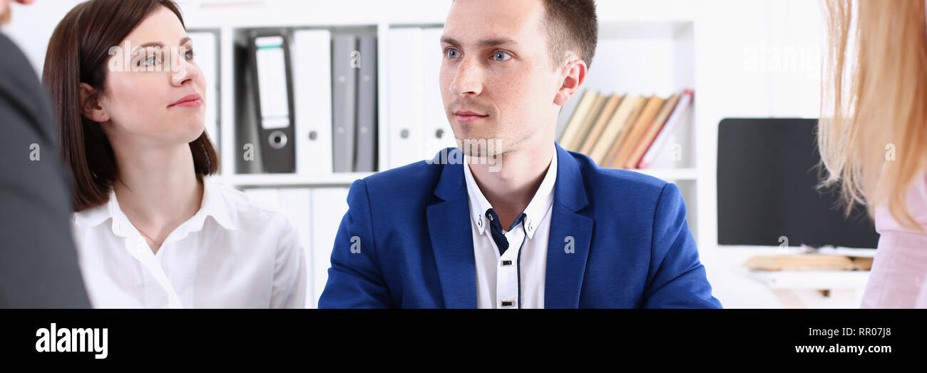 Group of people sit in office deliberate Stock Photo - Alamy