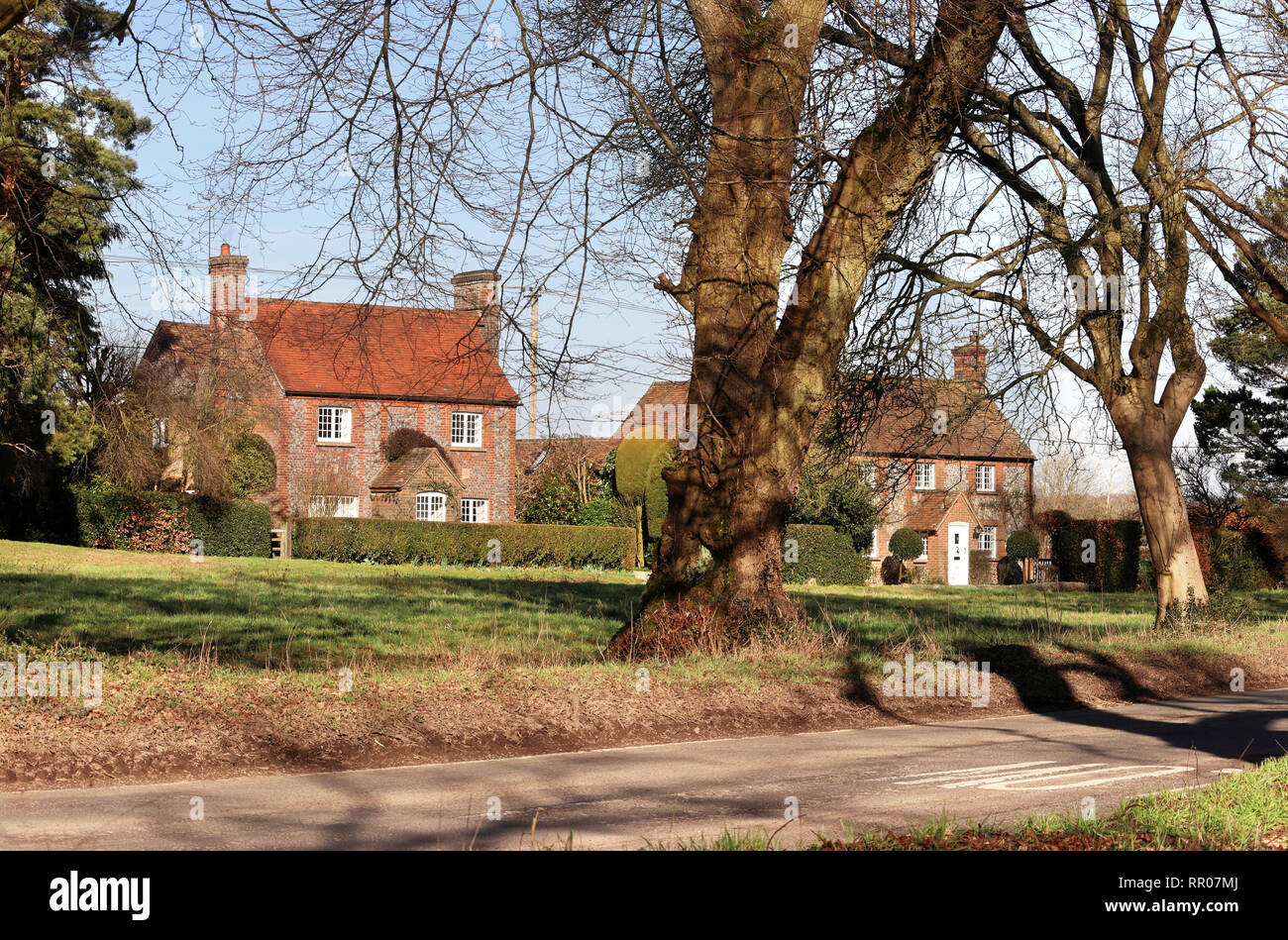 A Traditional English Village Brick and Flint Cottages in Winter ...