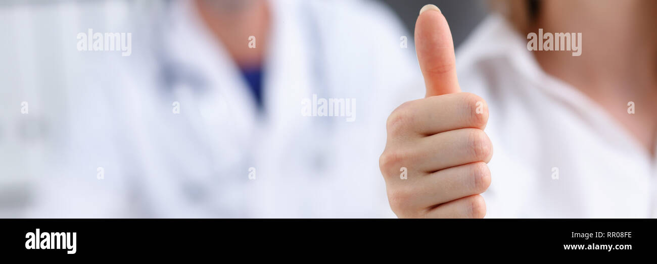 Arm show ok or confirm with thumb up at Stock Photo - Alamy