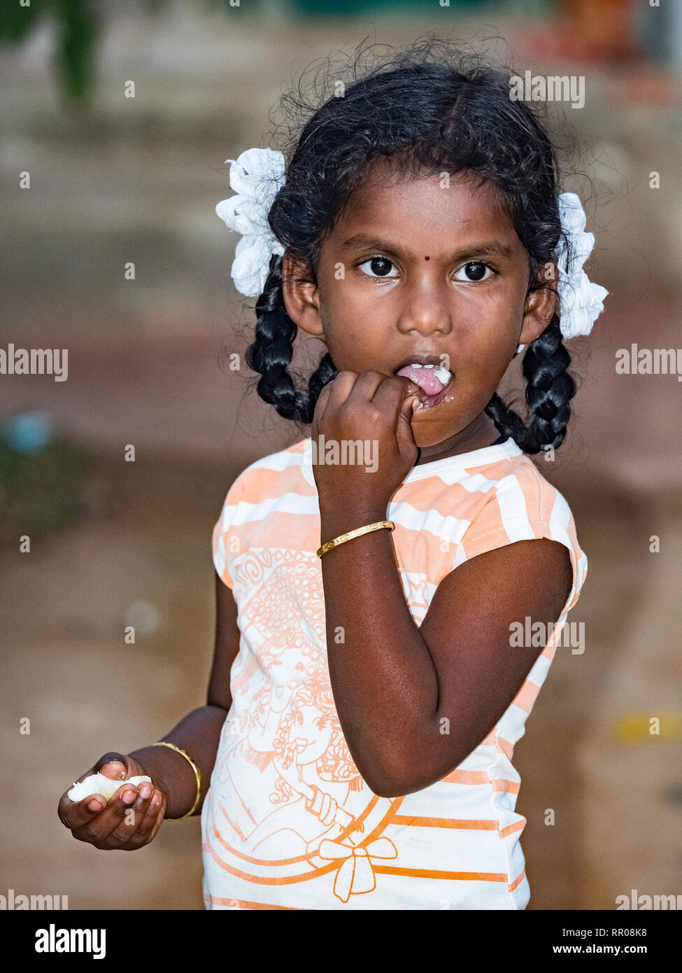 Coy expression hi-res stock photography and images - Alamy
